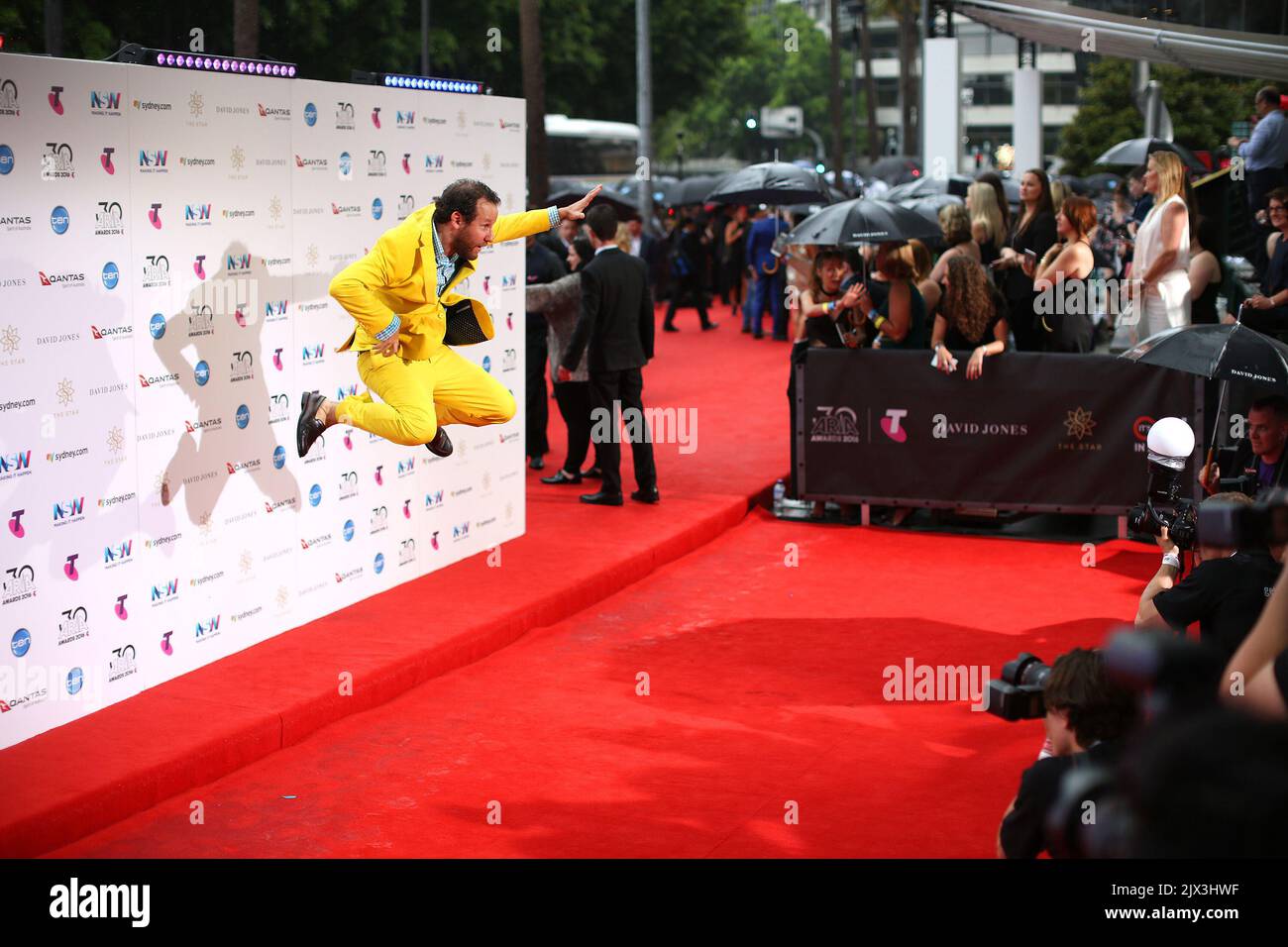 Musician Ben Lee jumps for photographers as he arrives to the 30th ARIA ...