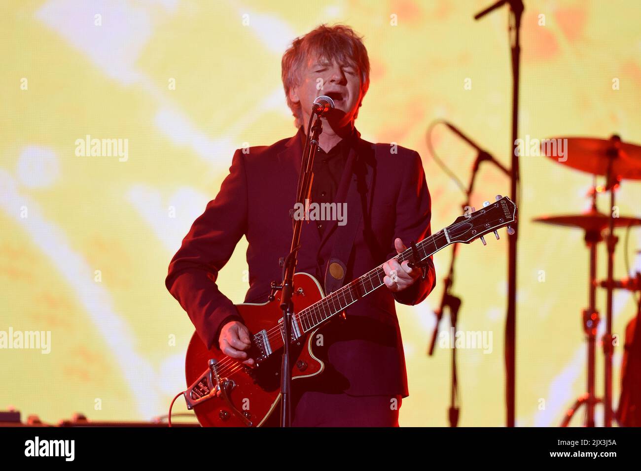 Neil Finn of Crowded House performs with the band after being inducted ...