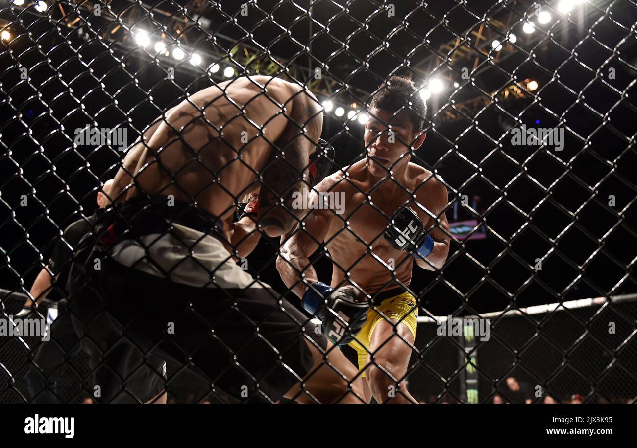 iJenel Lausa of the Philippines fights Yao Zhikui of China in an Early ...