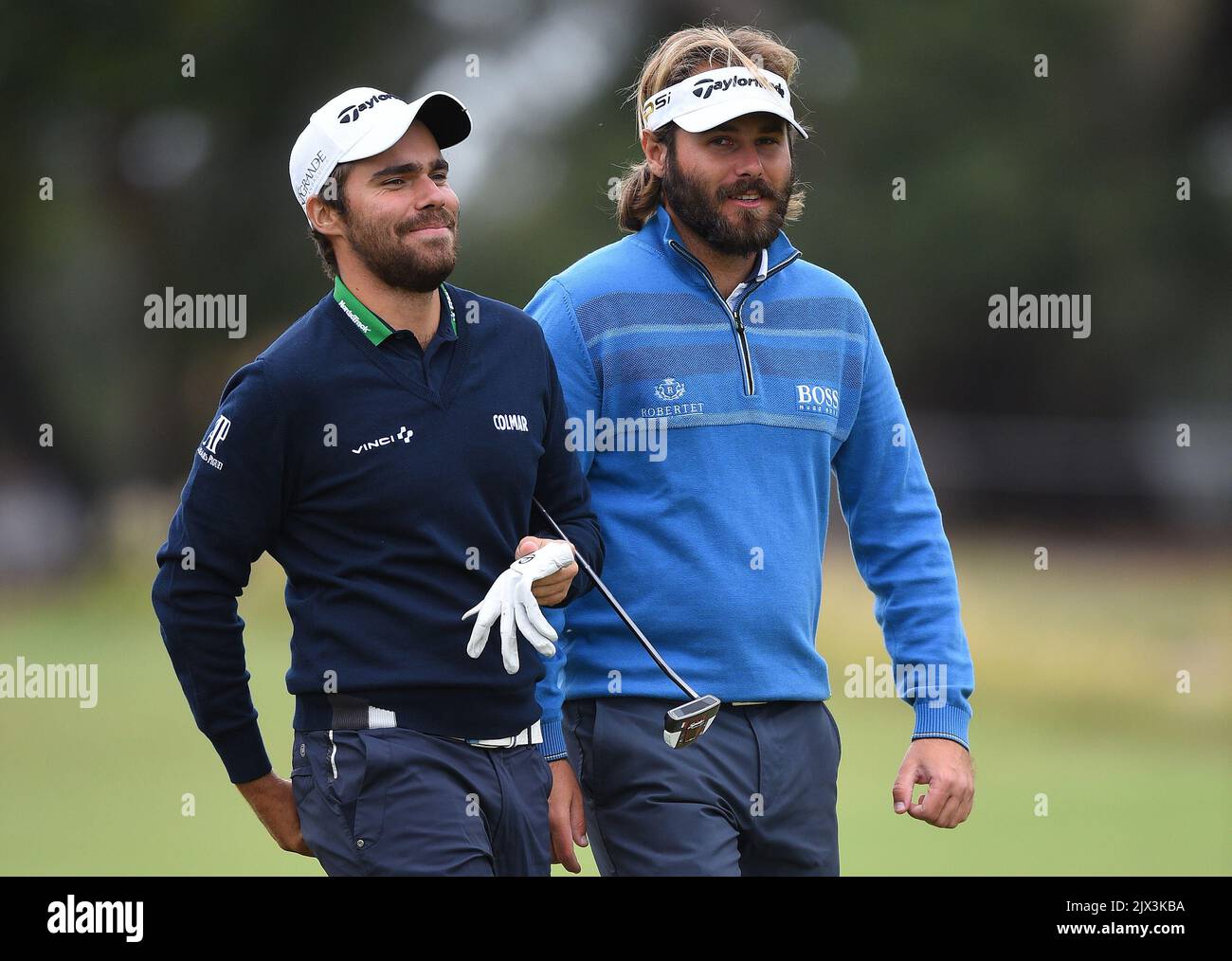 Romain Langasque (left) and Victor Dubuisson of France are seen during ...