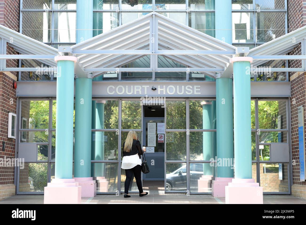 A lady enters Burwood Local Court in Sydney on Wednesday, Nov. 30, 2016 ...