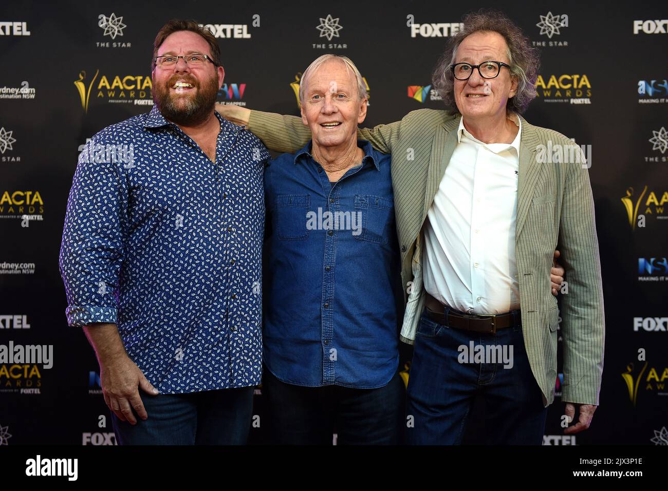 Australian comedian and actor Paul Hogan, (centre), poses for a ...