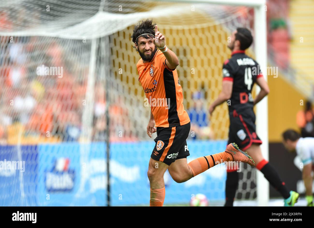 Thomas Broich of the Brisbane Roar celebrates scoring a goal during ...