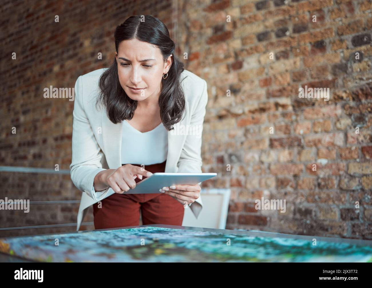 Art gallery painting, woman and tablet for working and planning abstract exhibition for studio ...