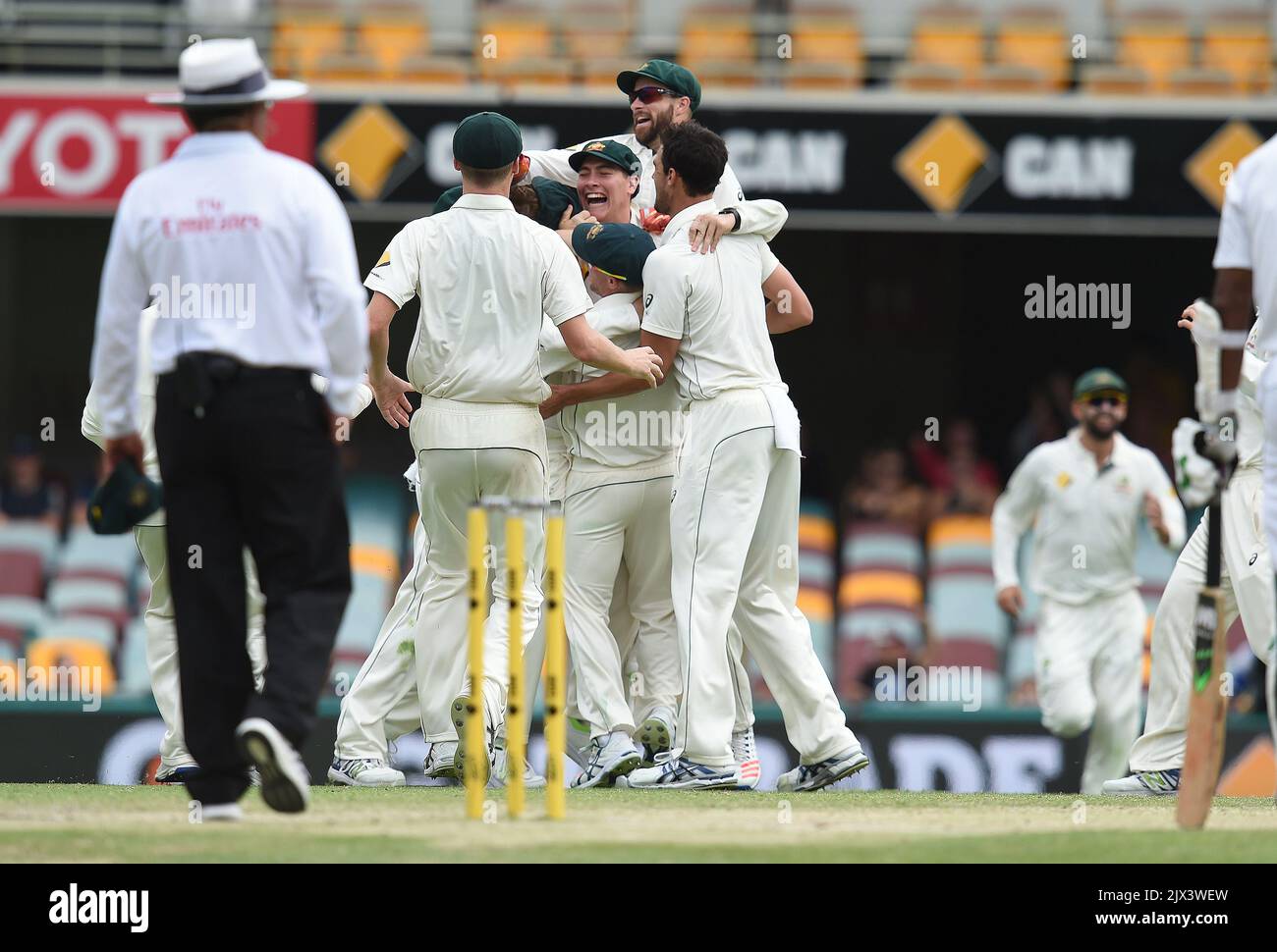 The Australian team celebrate after winning the first Test match ...