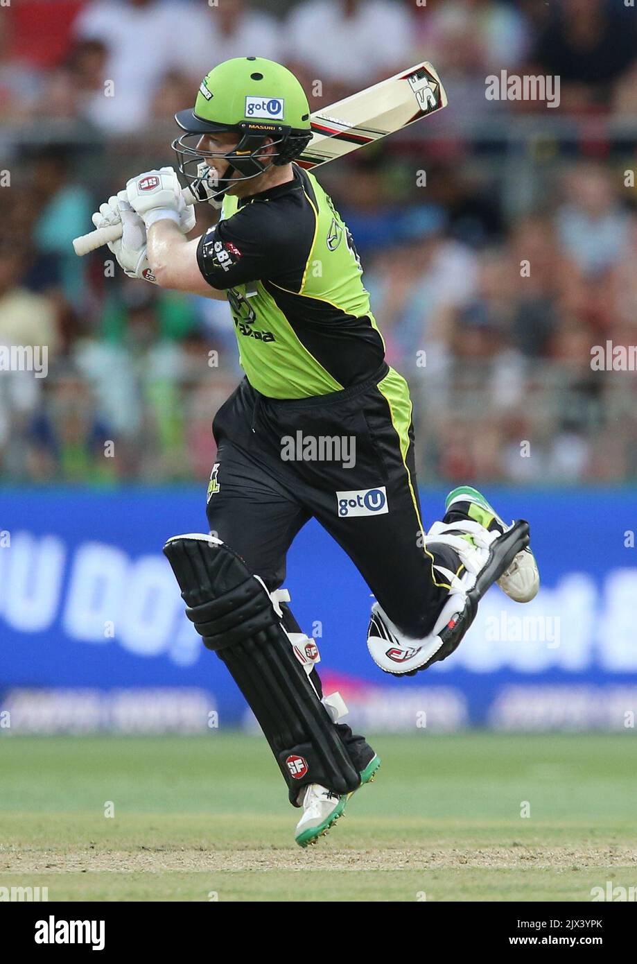 Eoin Morgan of the Thunder plays a shot during the Big Bash League (BBL ...