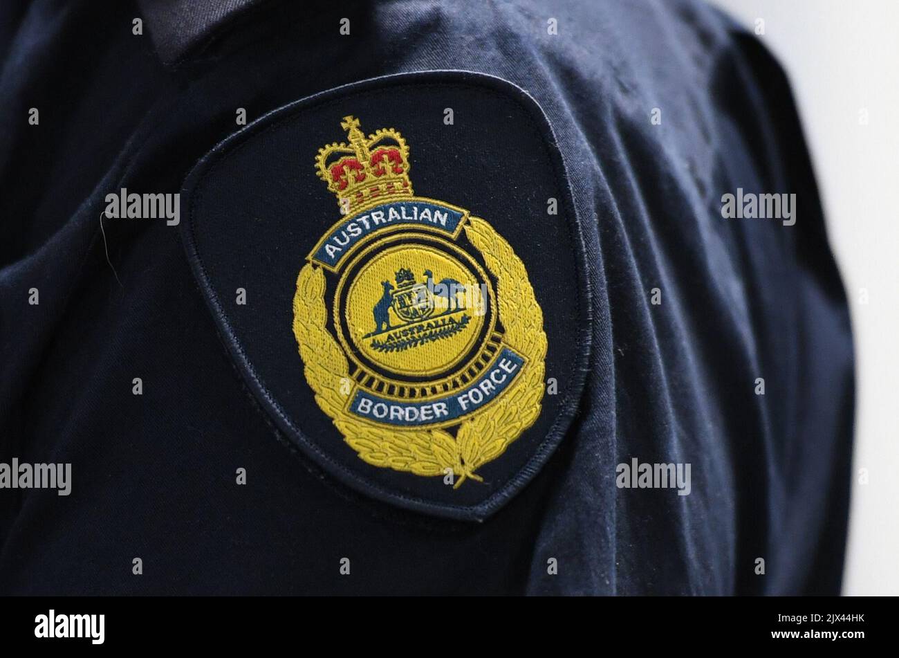 An Australian Border Force emblem is seen on a uniform during a press ...