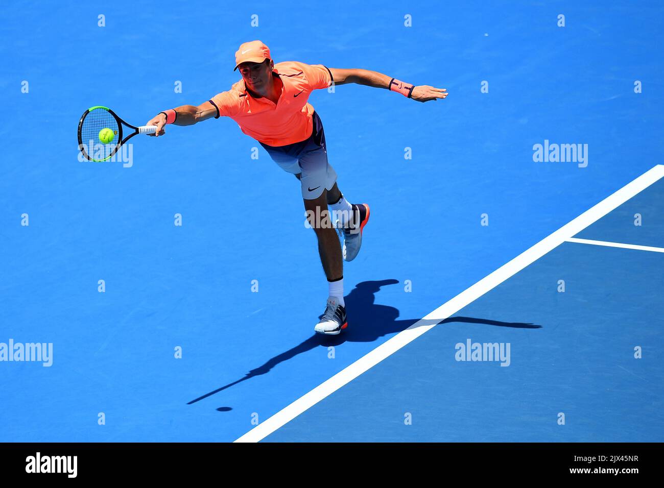 Andrey Kuznetsov of Russia returns a shot to Pablo Carreno Busta of ...