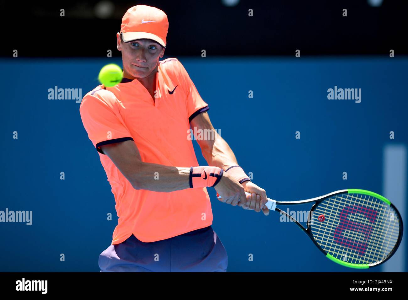 Andrey Kuznetsov of Russia returns a shot to Pablo Carreno Busta of ...