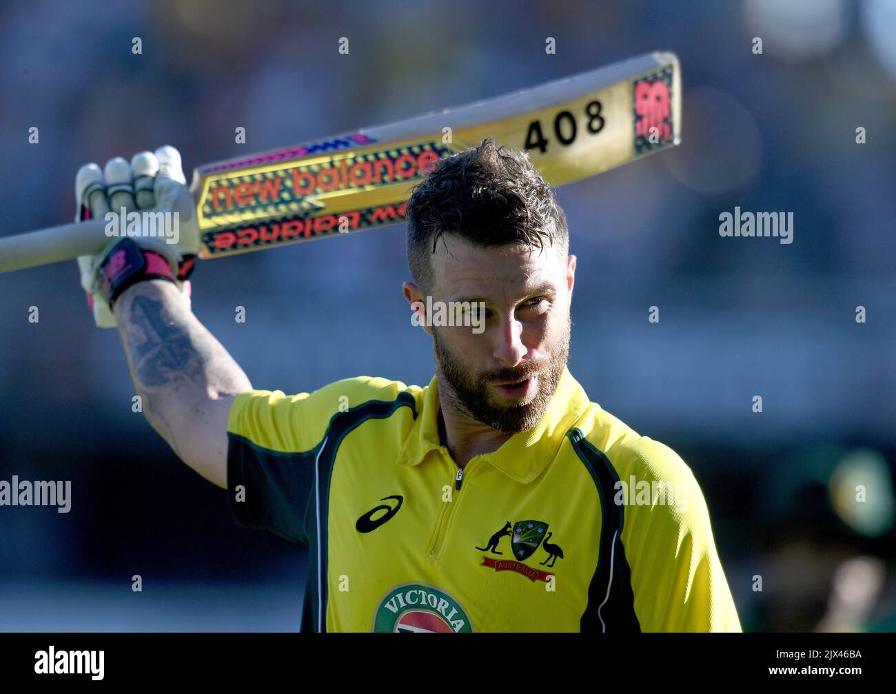 Australian batsman Matthew Wade celebrates after scoring a century ...