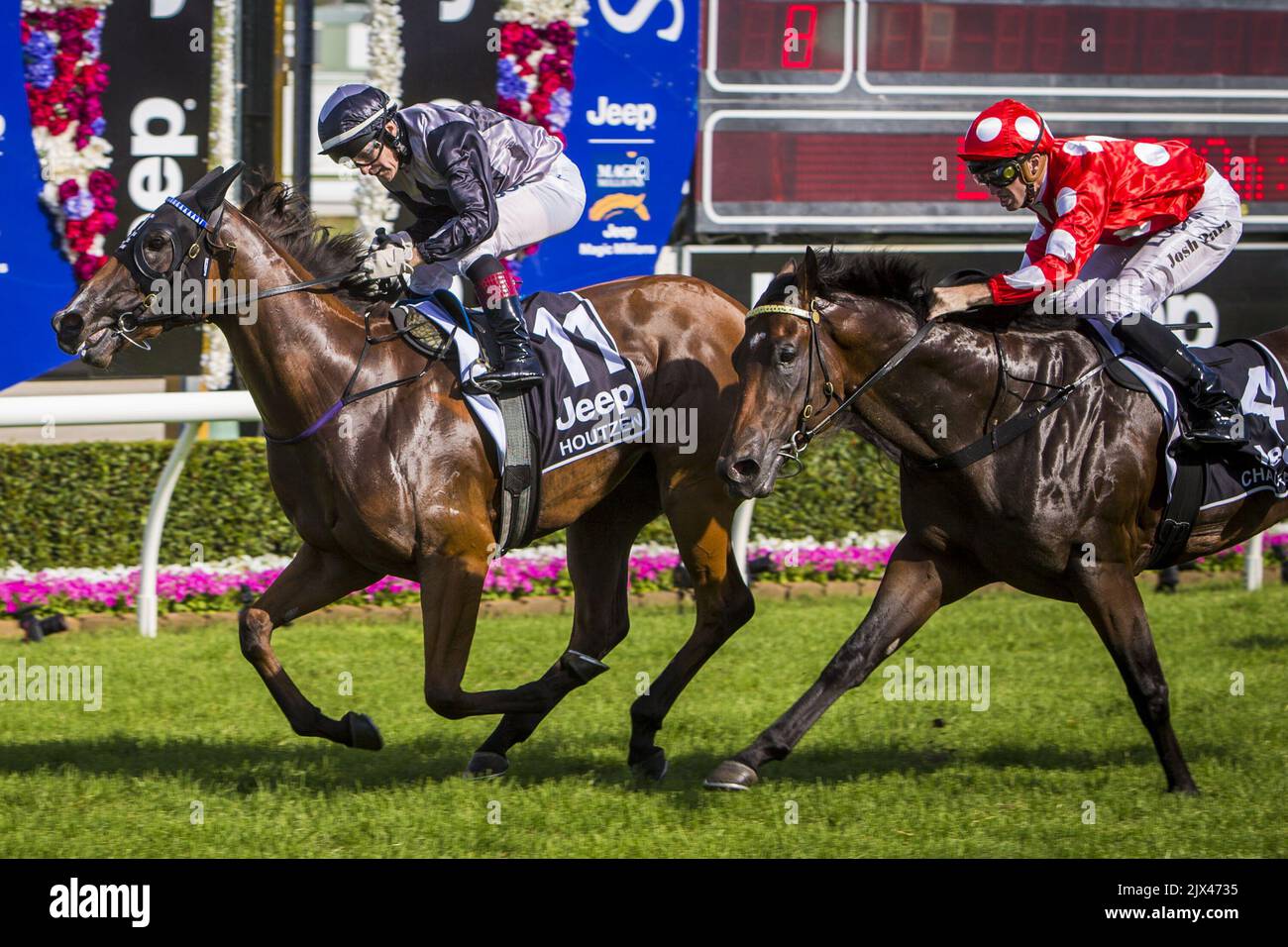 Jockey Jeff Lloyd riding Houtzen wins the Magic Millions 2YO Classic at ...