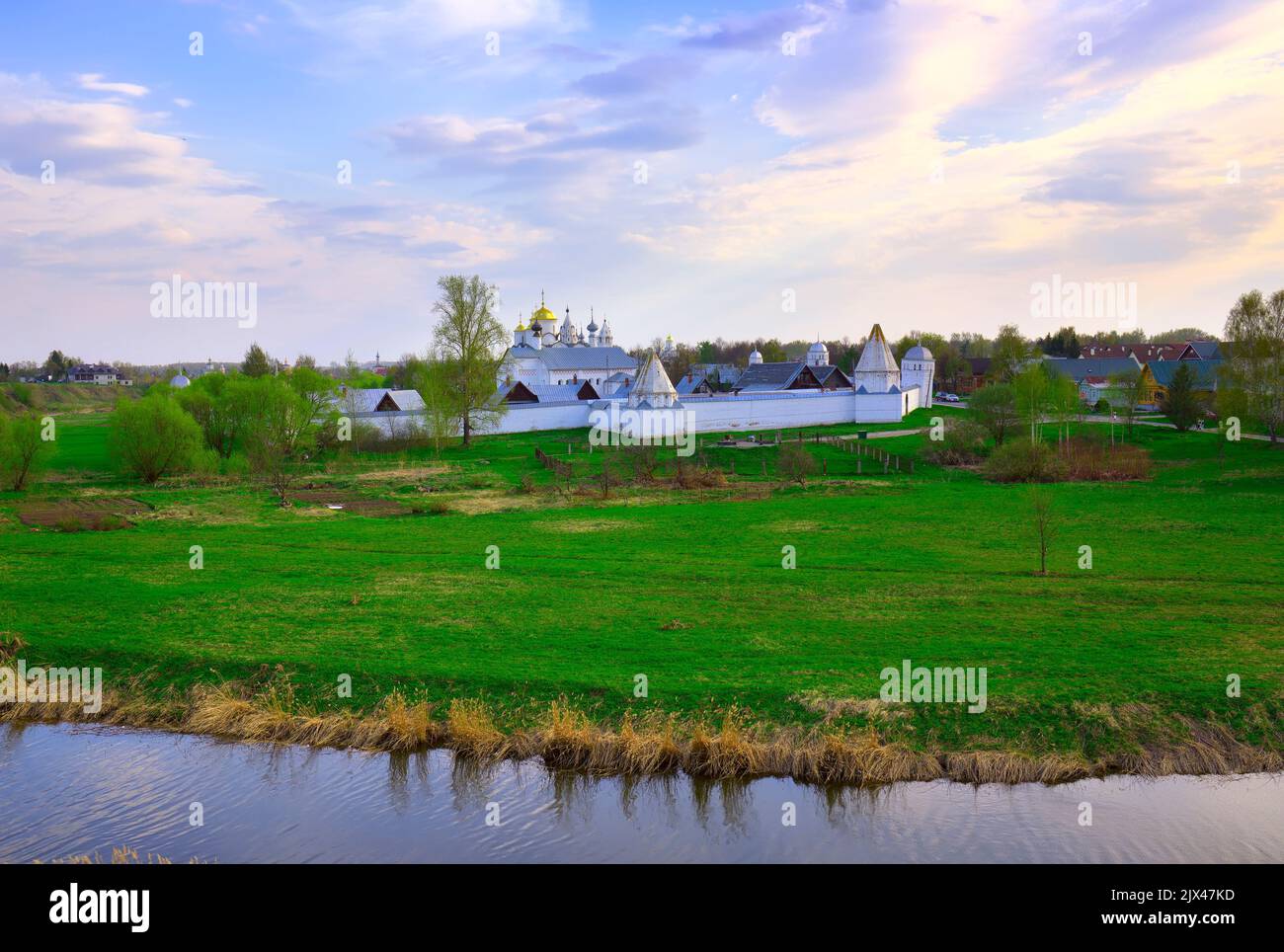 Pokrovsky Convent on the river bank. An old Orthodox monastery of ...