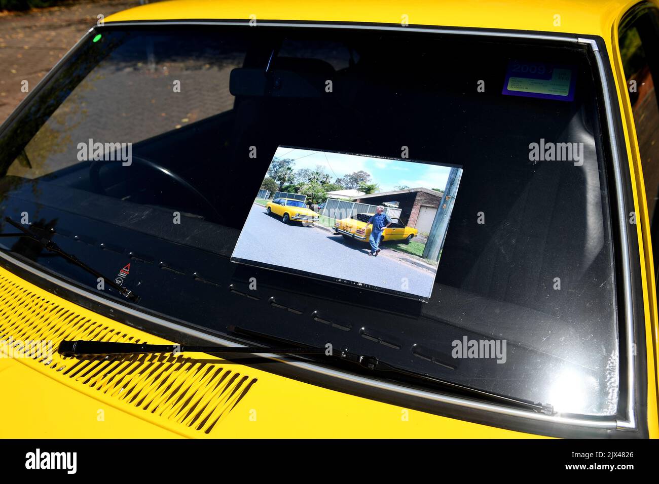 A photograph of Michael Chamberlain is seen inside a Holden Torana used ...