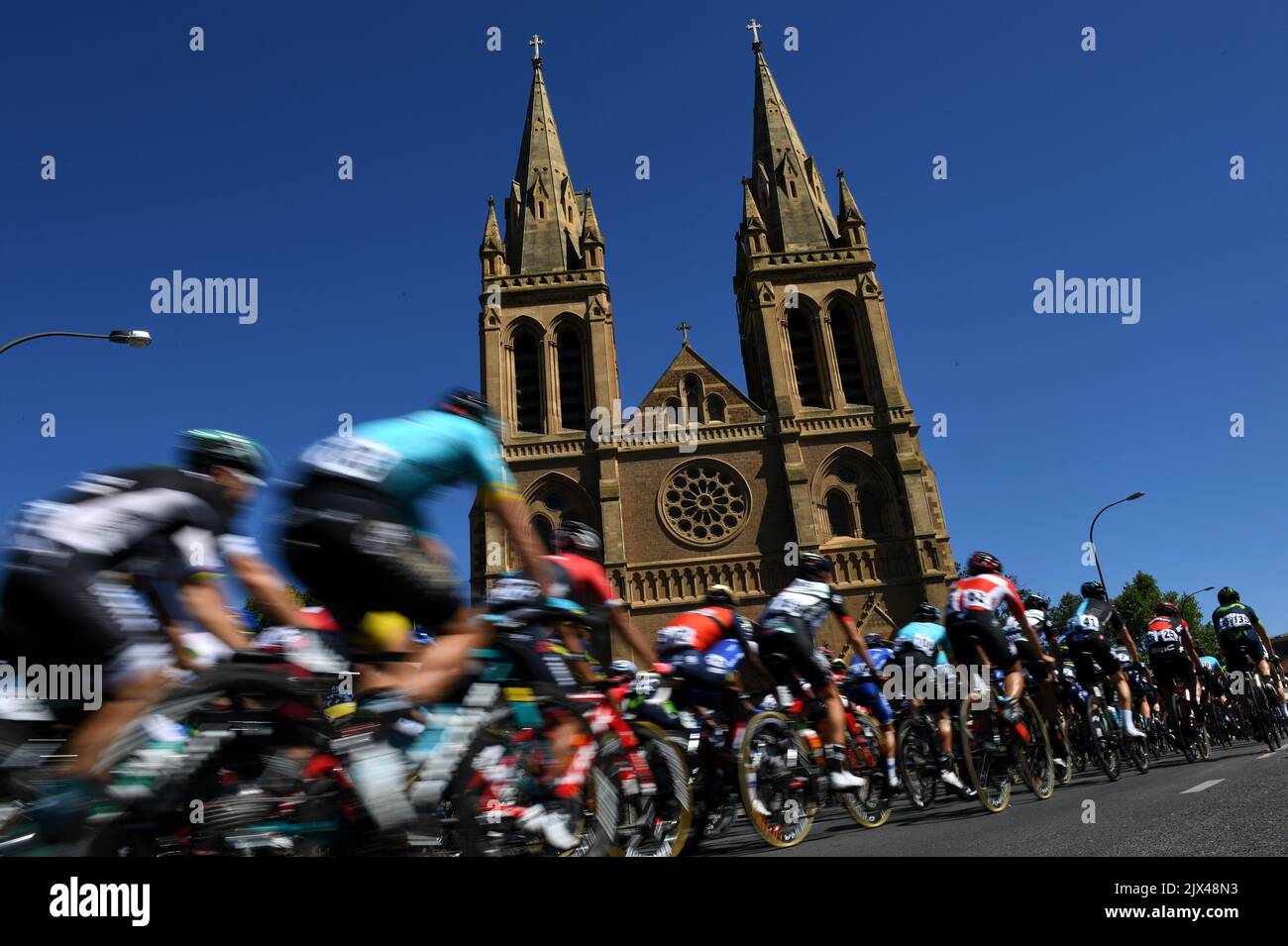 The peloton rolls past St Peter's Cathedral during stage one of the ...