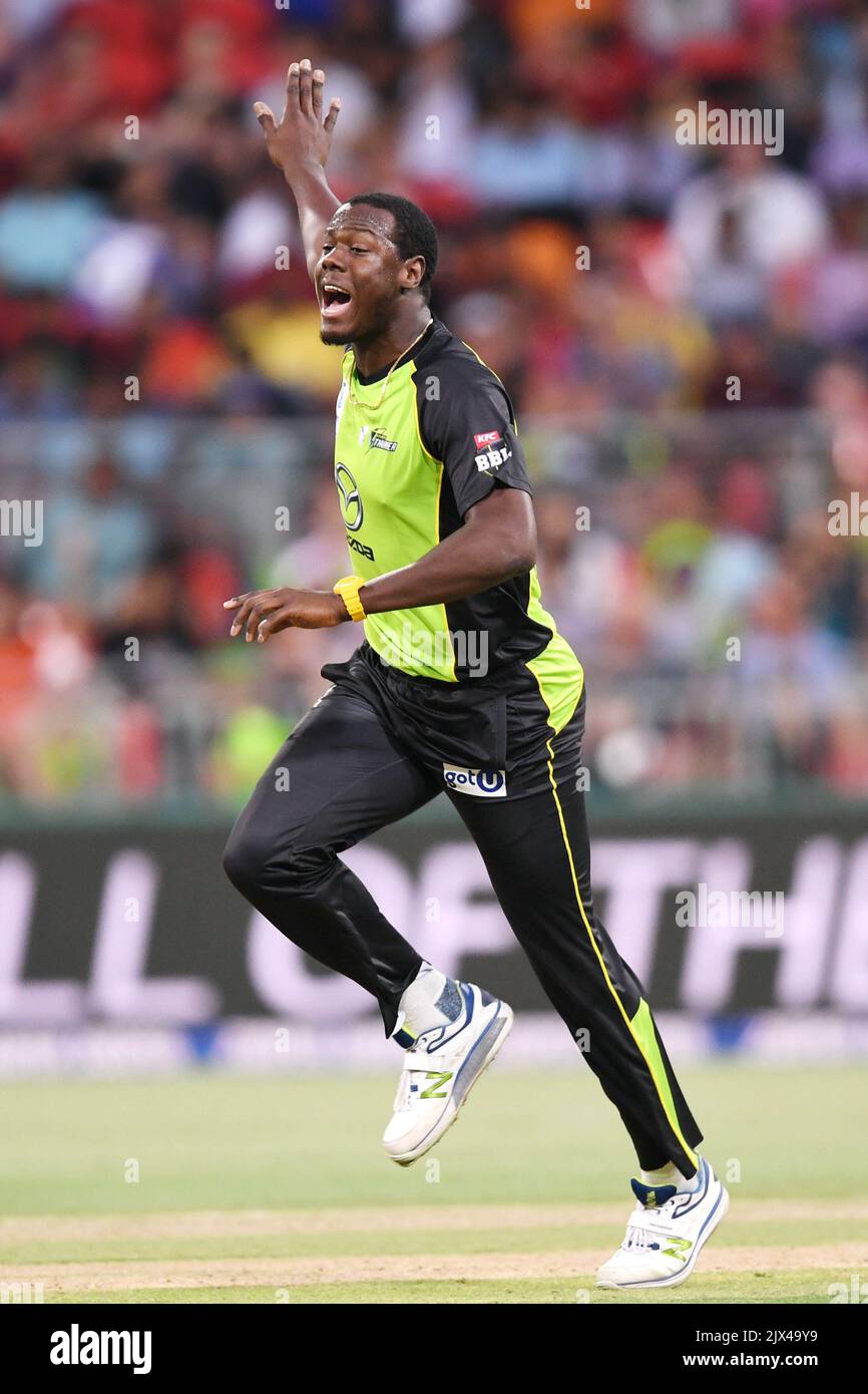 Carlos Braithwaite of the Thunder celebrates taking the wicket of Tim ...