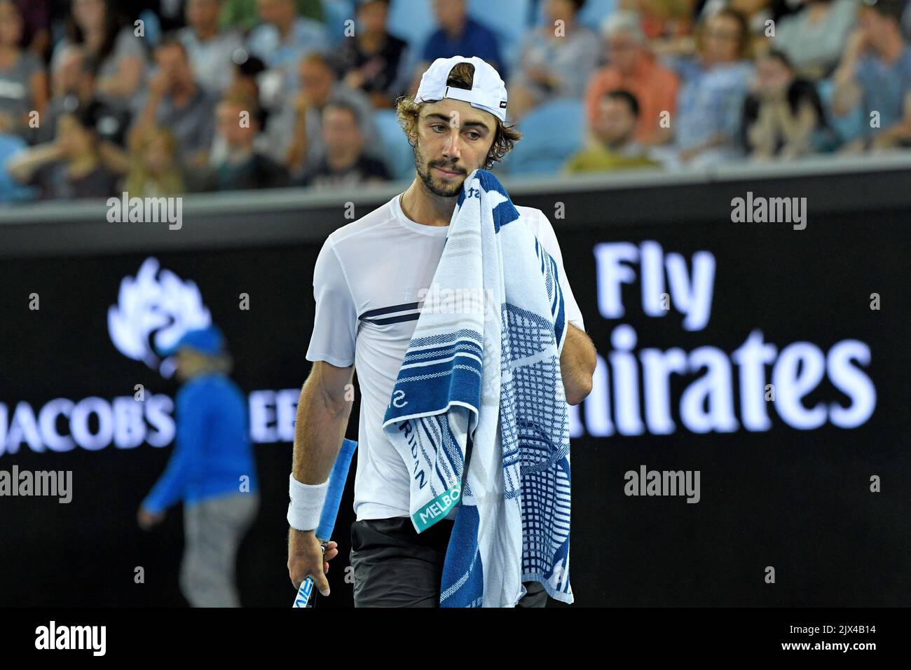 Jordan Thompson of Australia in action against Dominic Thiem of Austria ...