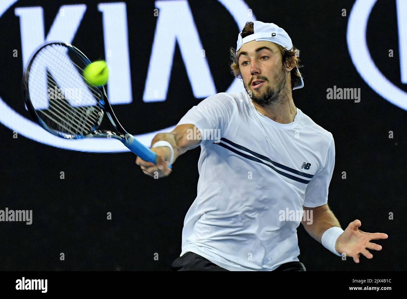Jordan Thompson of Australia in action against Dominic Thiem of Austria ...