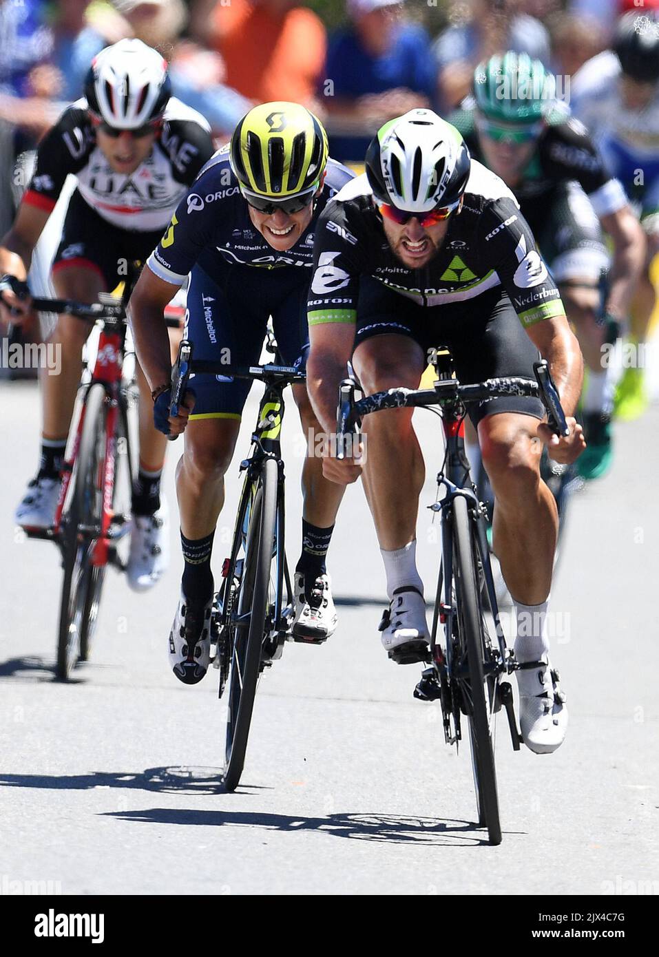 Nathan Haas of team Dimension Data (right) edges Esteban Chaves of team ...