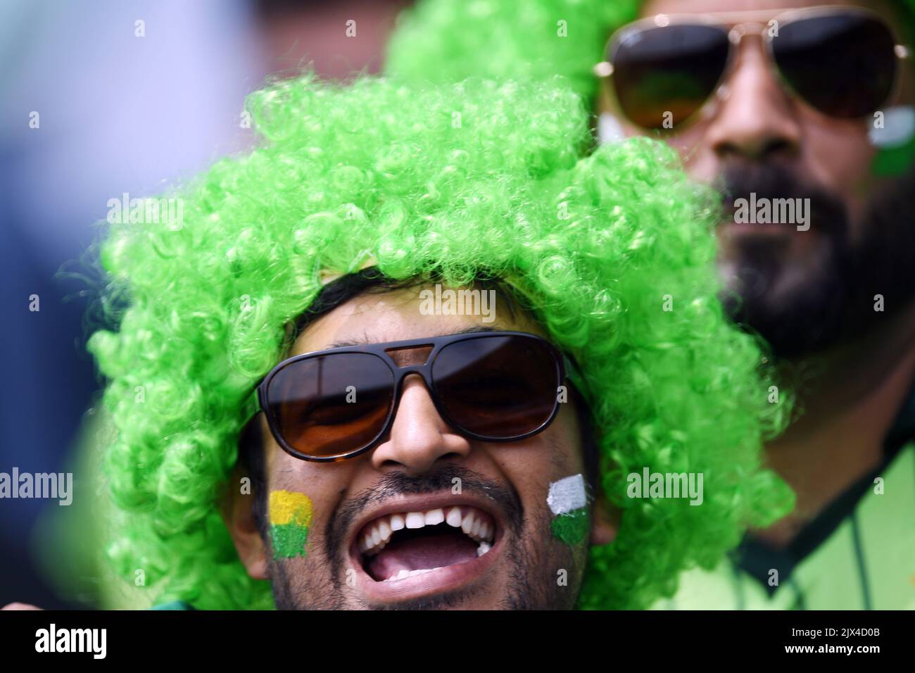Pakistan fans pose for a photograph during the fourth One Day ...