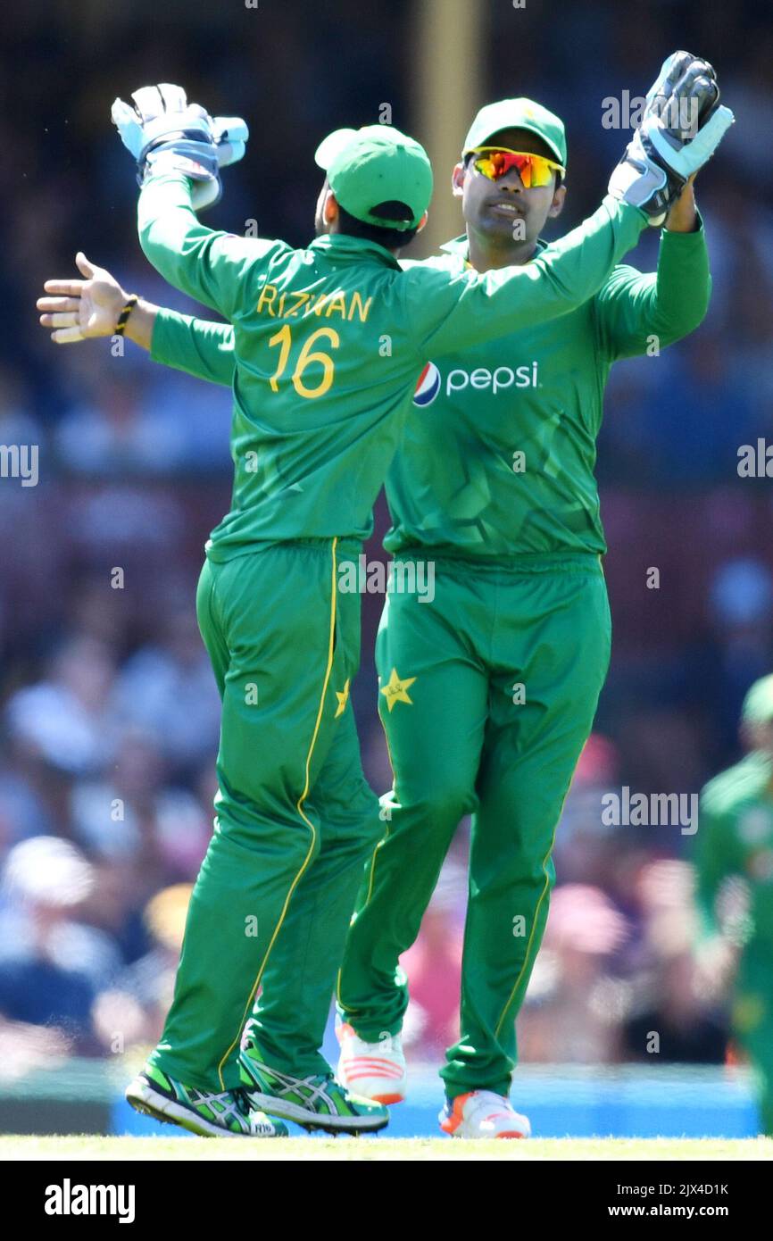 Mohammad Rizwan (left) of Pakistan is congratulated by Babar Azam after ...