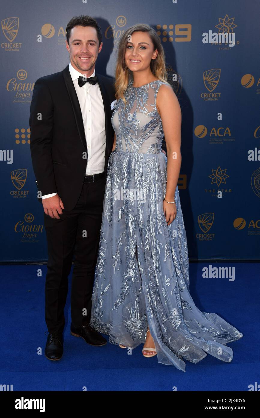 Australian cricket player Travis head and partner Jessica Davies pose ...