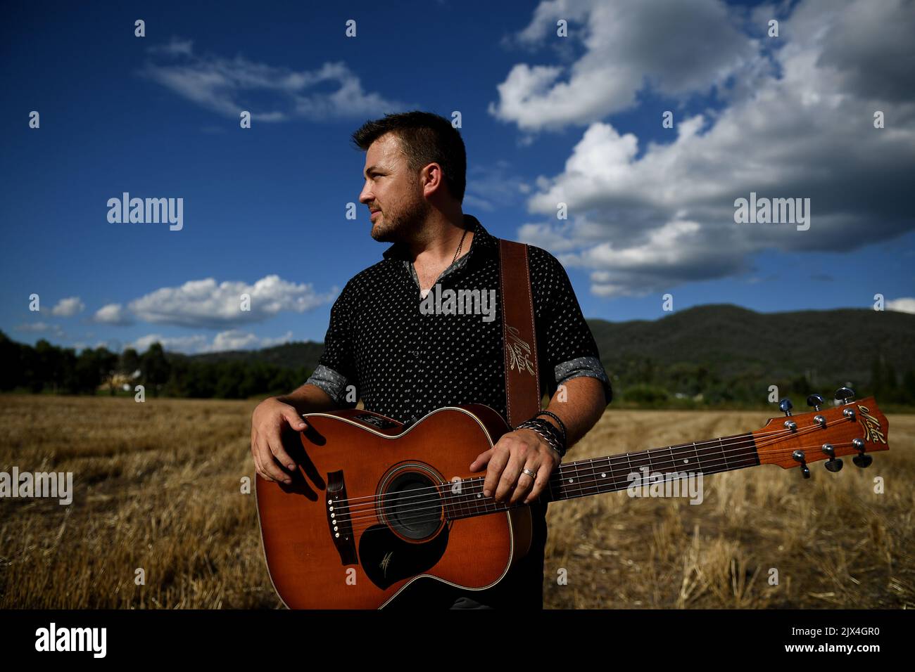 Australian country musician Travis Collins poses for a photograph ...