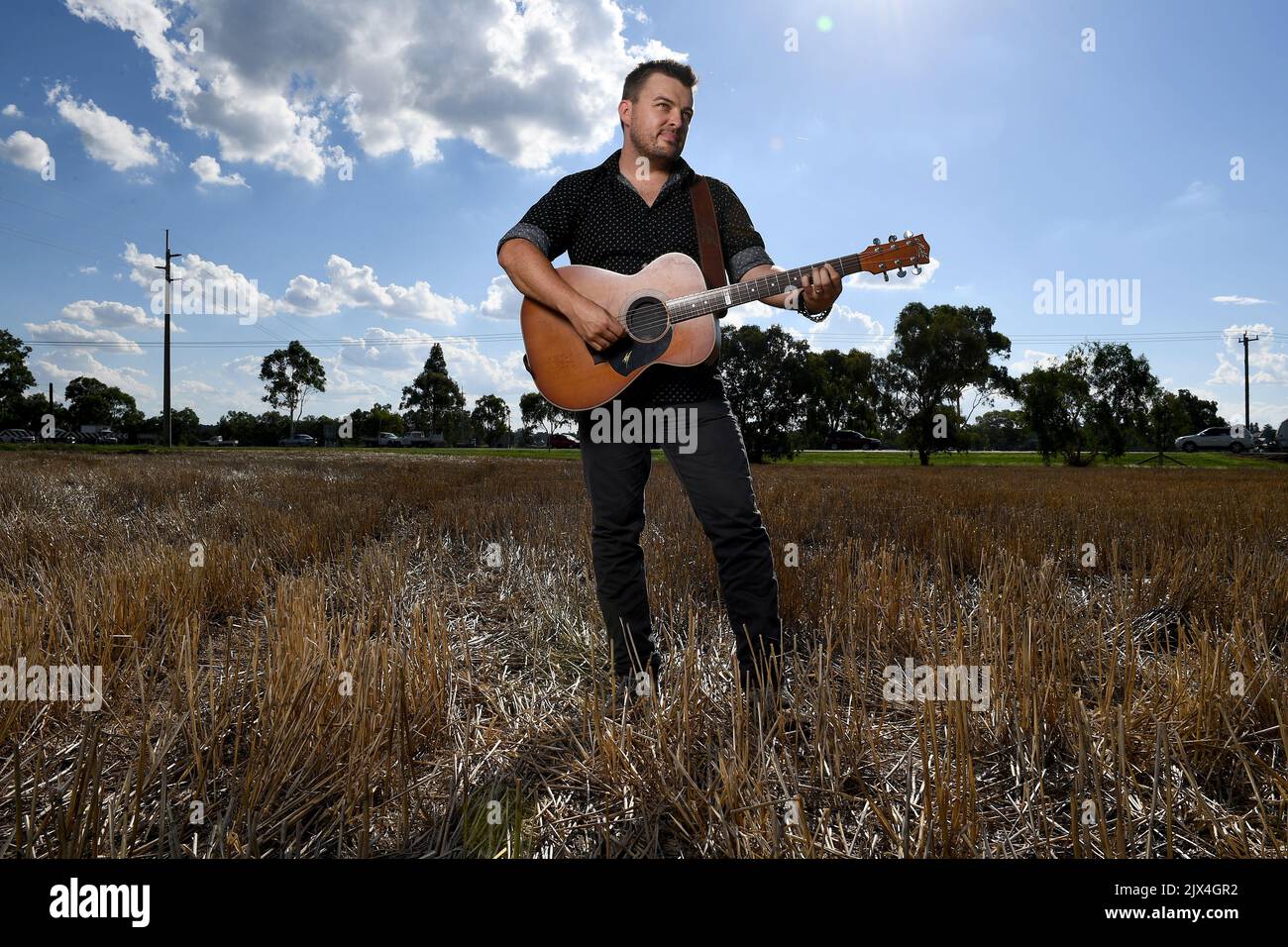 Australian country musician Travis Collins poses for a photograph ...