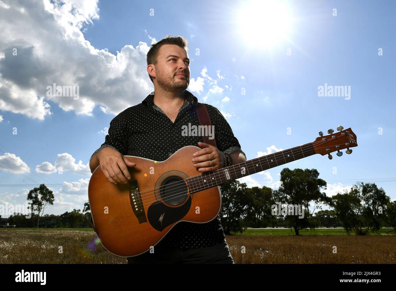 Australian country musician Travis Collins poses for a photograph ...