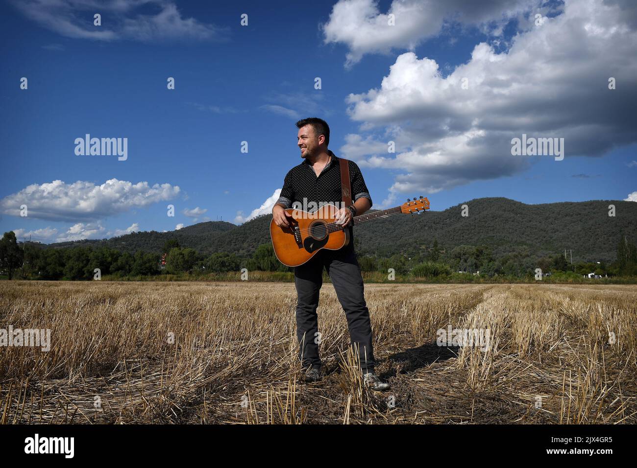 Australian country musician Travis Collins poses for a photograph ...