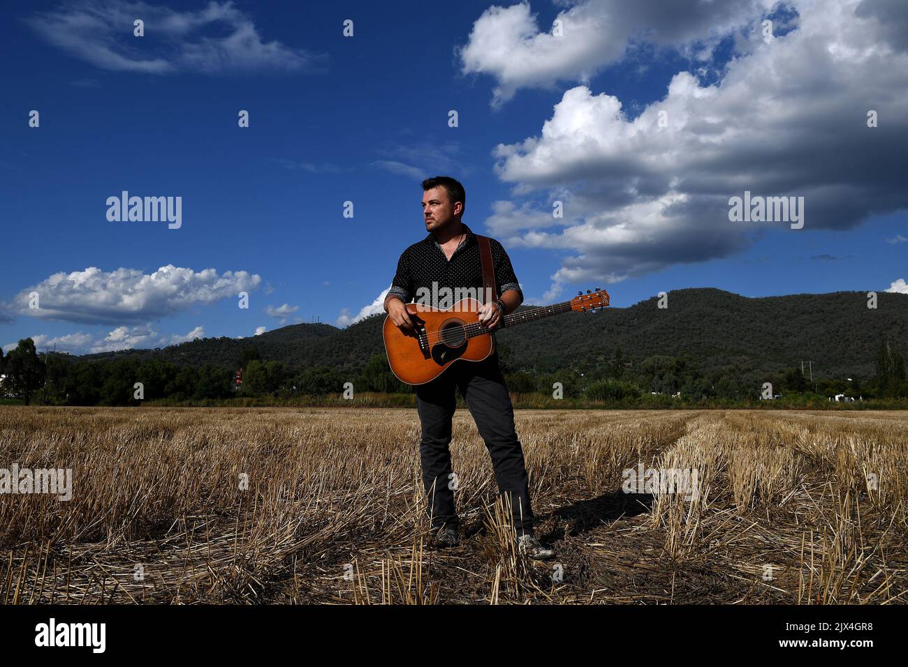 Australian country musician Travis Collins poses for a photograph ...