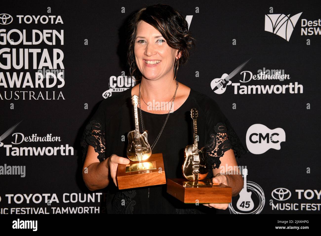Sara Storer poses for a photograph after receiving the Golden Guitar ...