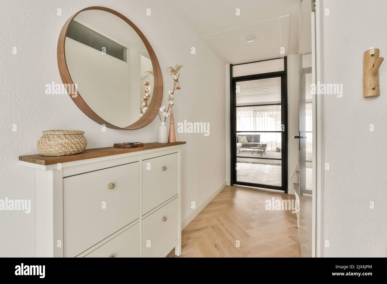 Corridor with glass door to living room Stock Photo - Alamy