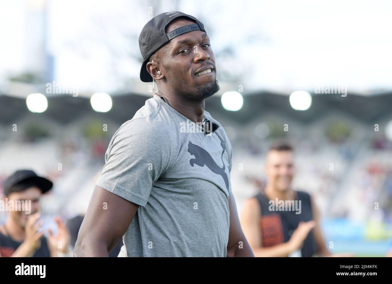 Jamaican sprinter Usain Bolt runs onto the field at the start of the ...