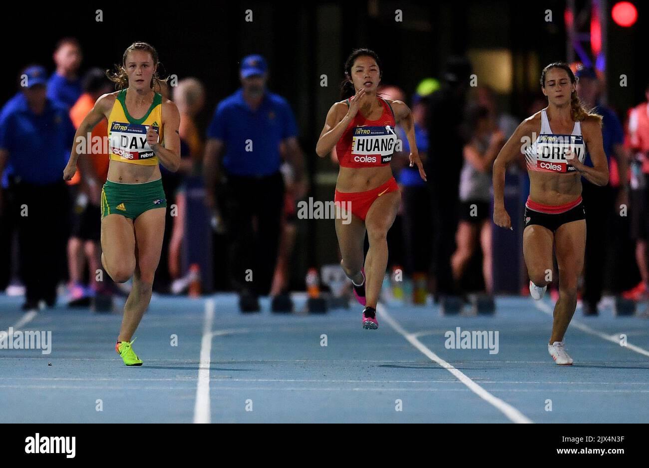 Australian athlete Riley Day (left) with Chinese athlete Jiaxin Huang ...