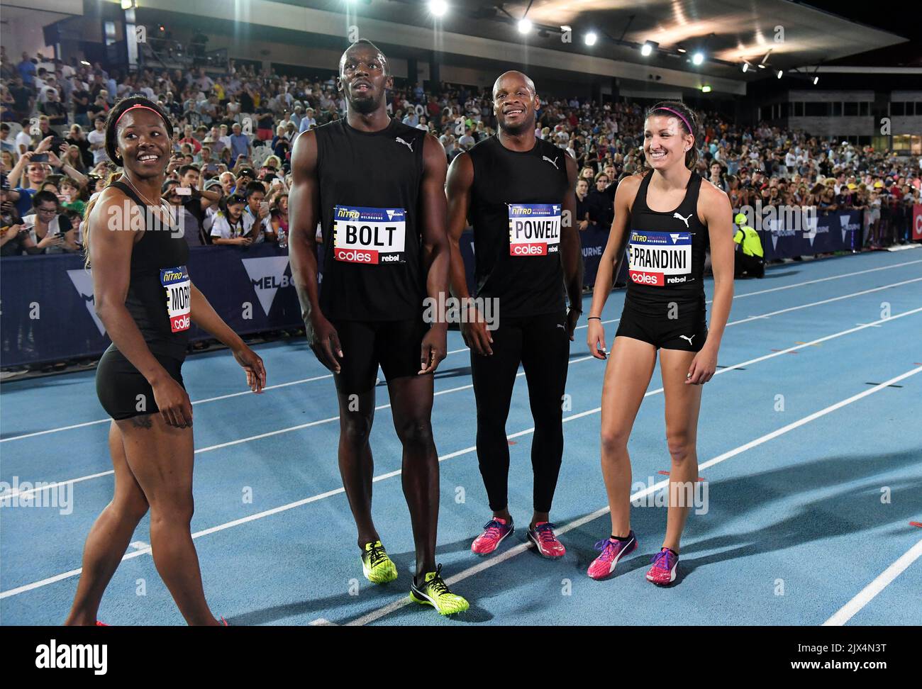 Jamaican sprinters Usain Bolt (centre left) with Asafa Powell (centre ...
