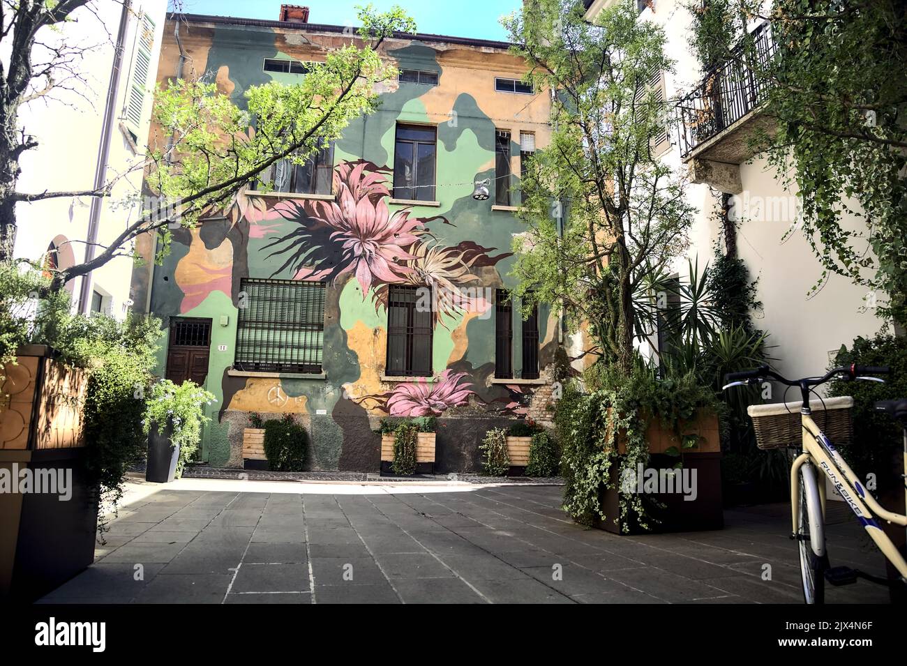 Mural on a facade of a house in a courtyard Stock Photo - Alamy