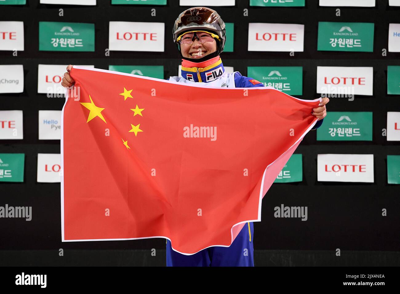 Mengtao Xu of China poses for a photograph after winning the women's ...