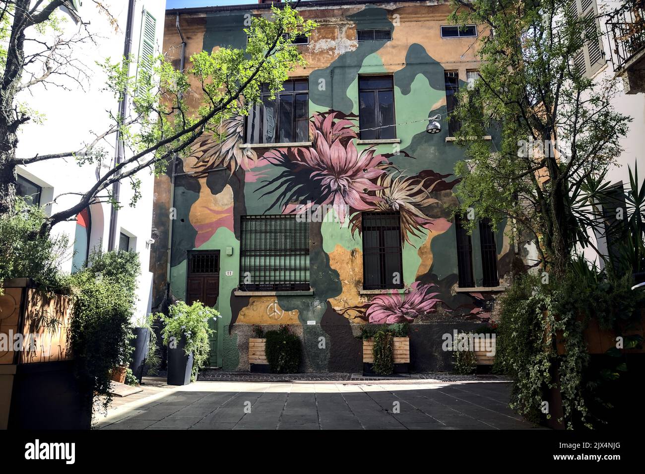 Mural on a facade of a house in a courtyard Stock Photo - Alamy