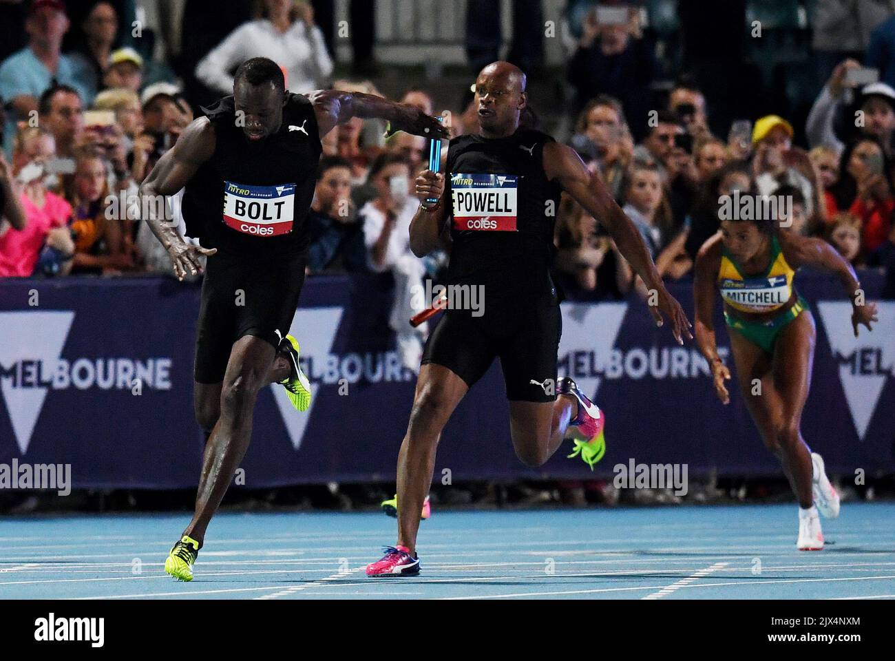 amaican sprinter Asafa Powell passes the batton to Jamaican sprinter ...