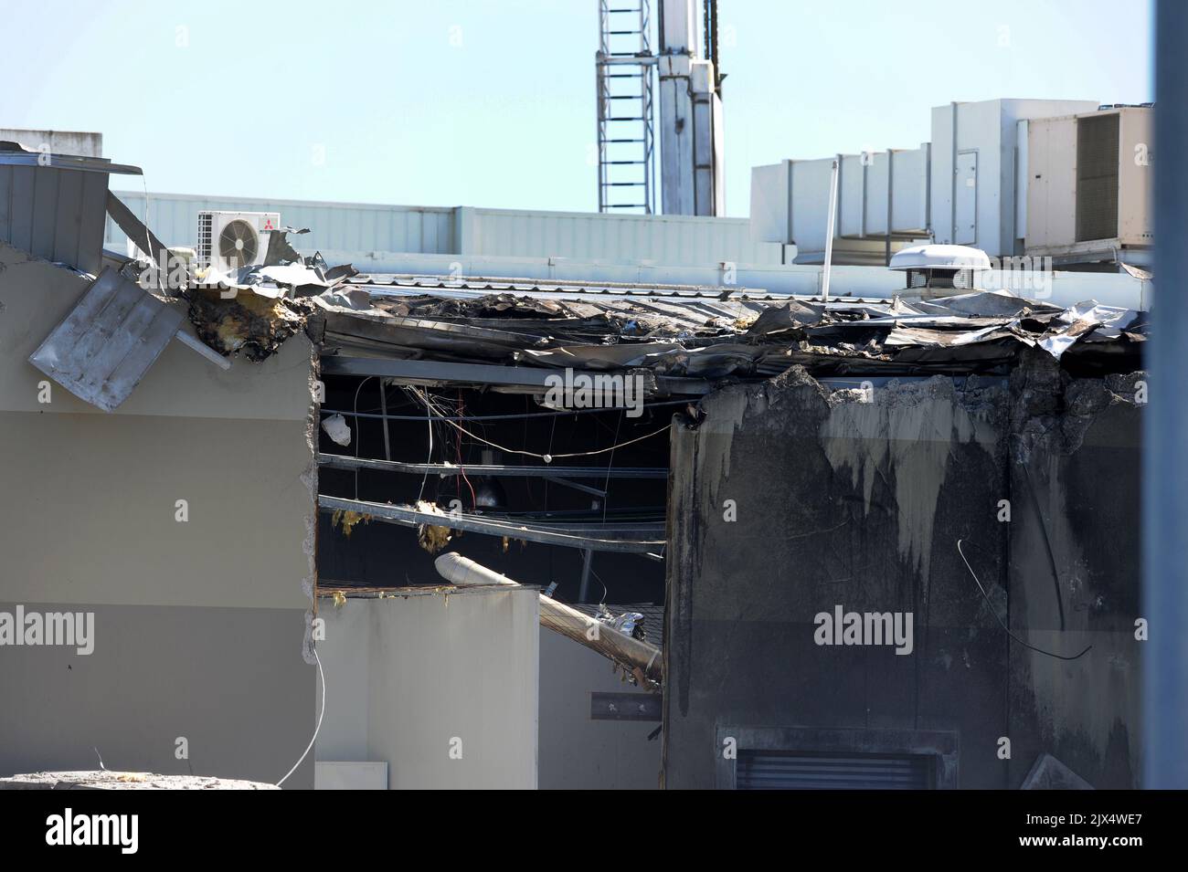 The scene where a light plane crashed into the back of a DFO building ...
