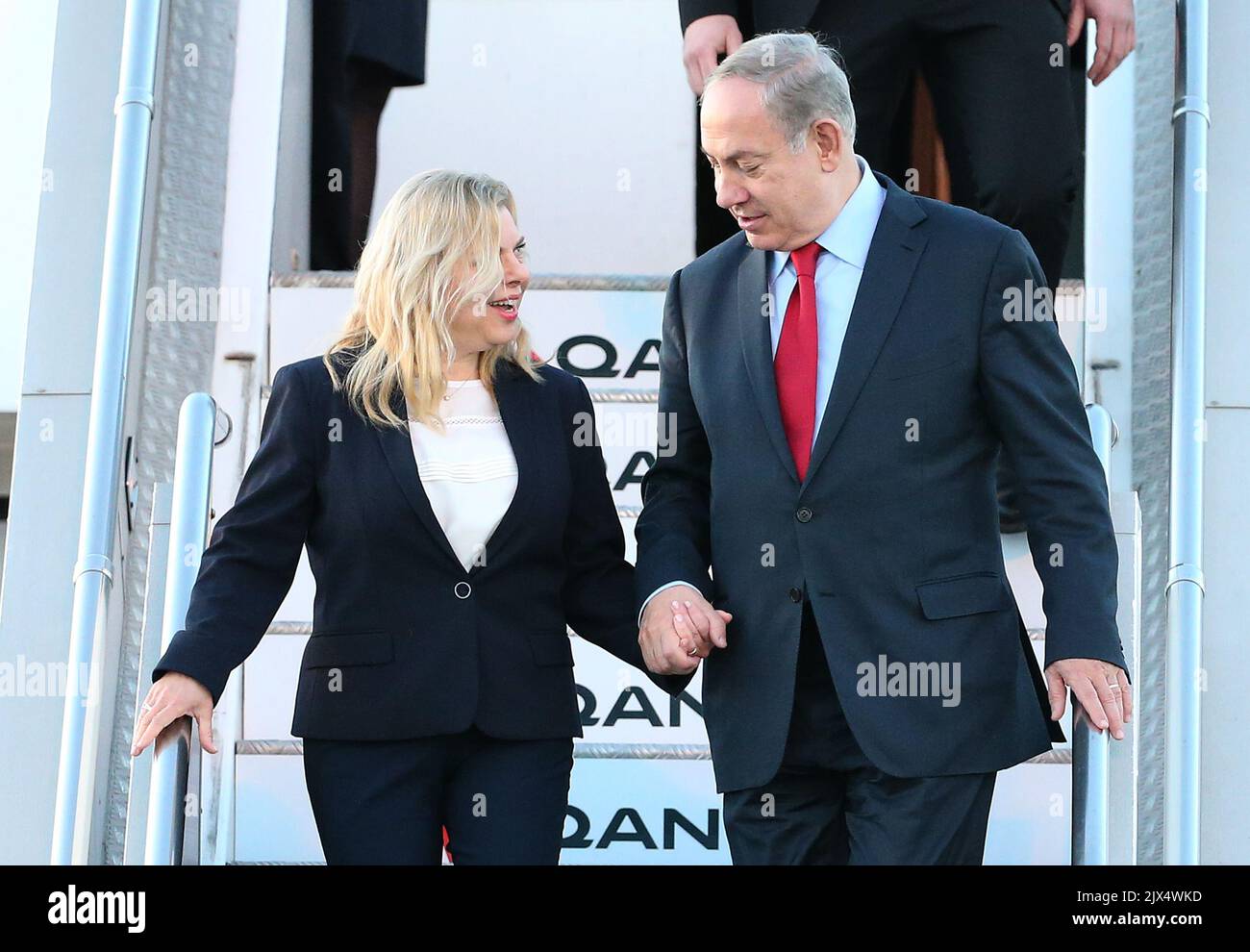 Israeli Prime Minister Benjamin Netanyahu holds hands with his wife Mrs ...