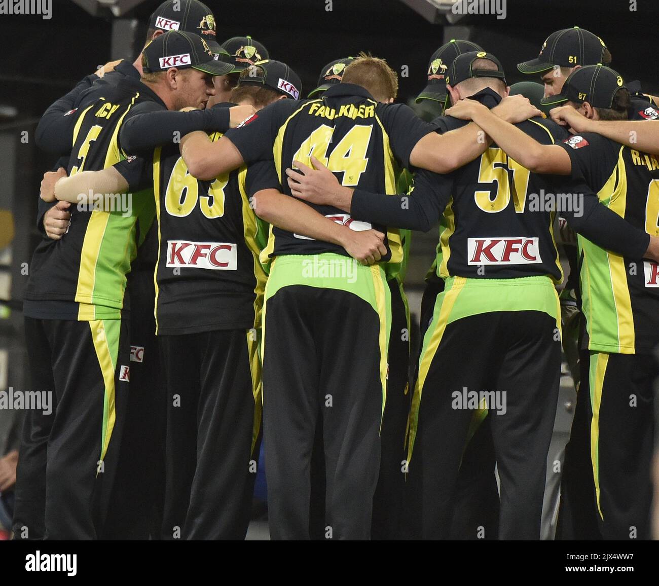 Australian players in a huddle before they field during the ...
