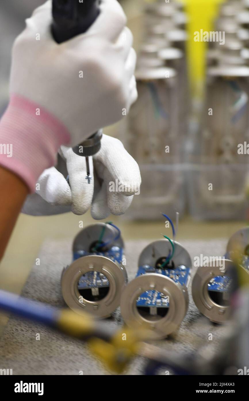 Stock image of manufacturing workers at the Rode Microphones factory in ...