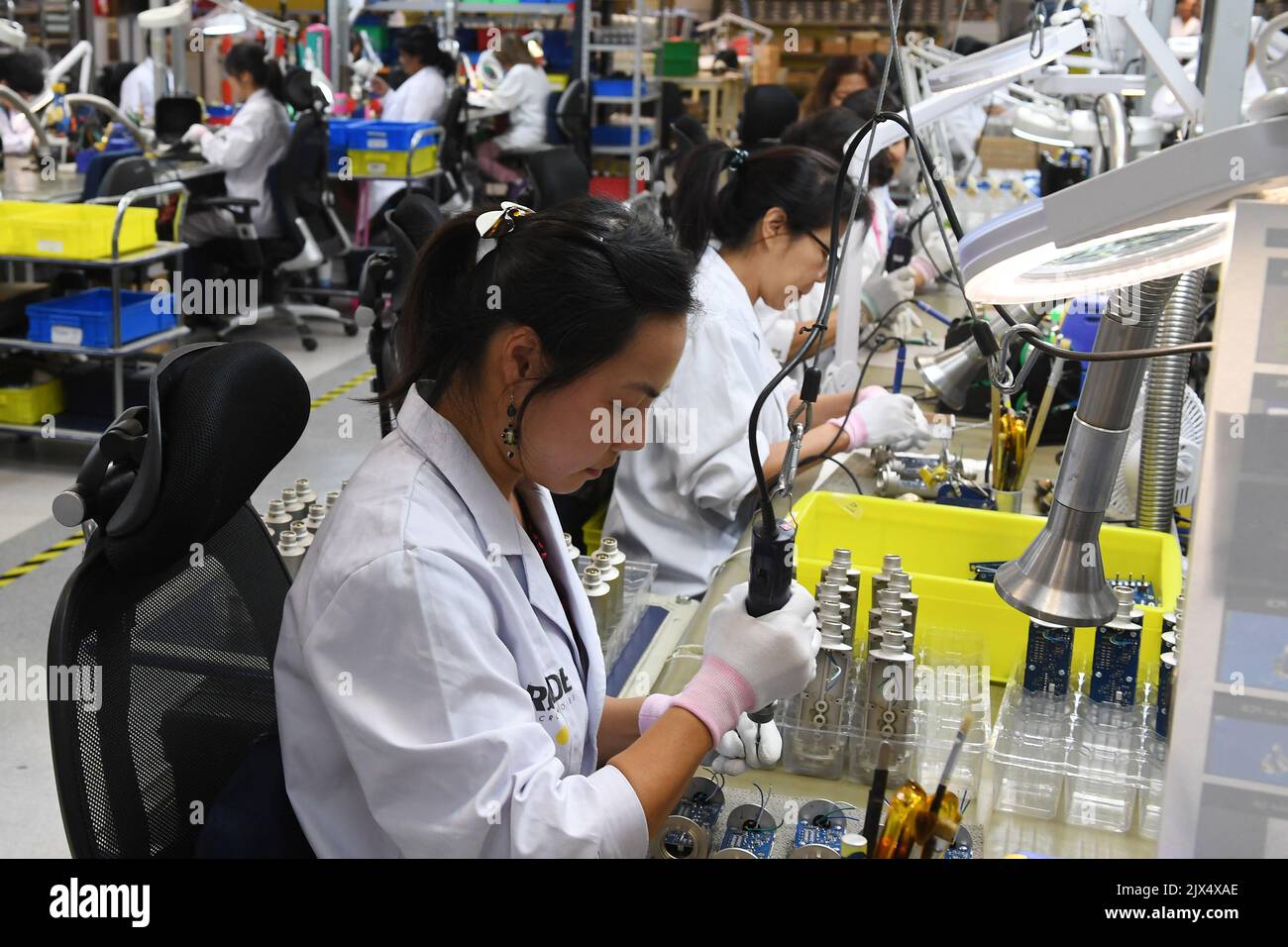 Stock image of manufacturing workers at the Rode Microphones factory in ...
