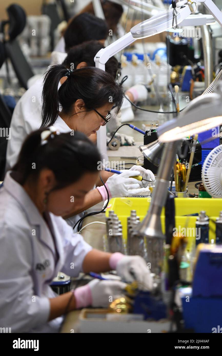 Stock image of manufacturing workers at the Rode Microphones factory in ...