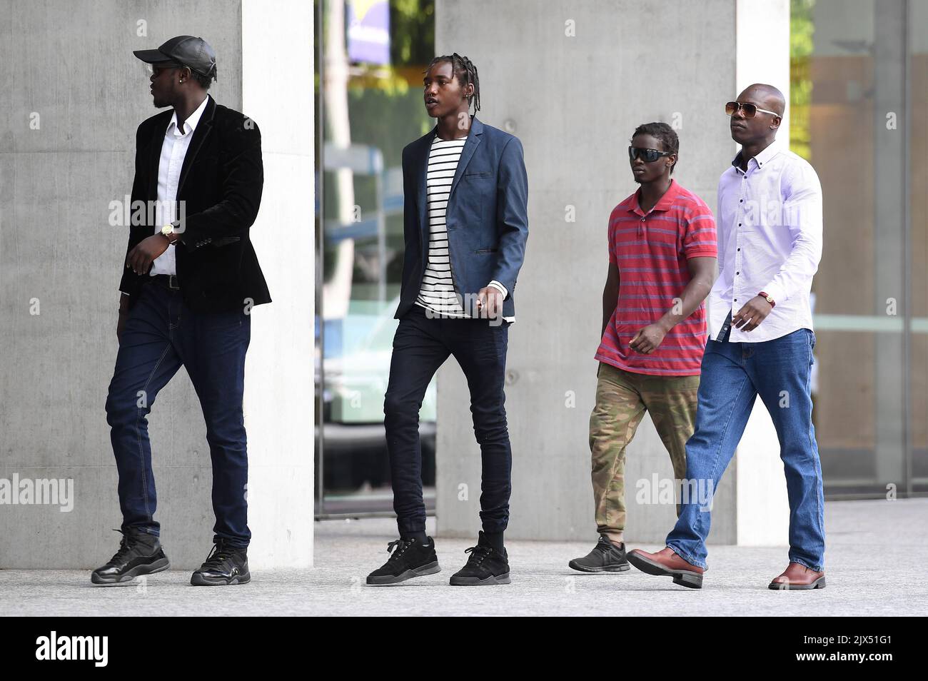 Aquaintances of Ariik Mayot arrive at the Supreme Court in Brisbane ...