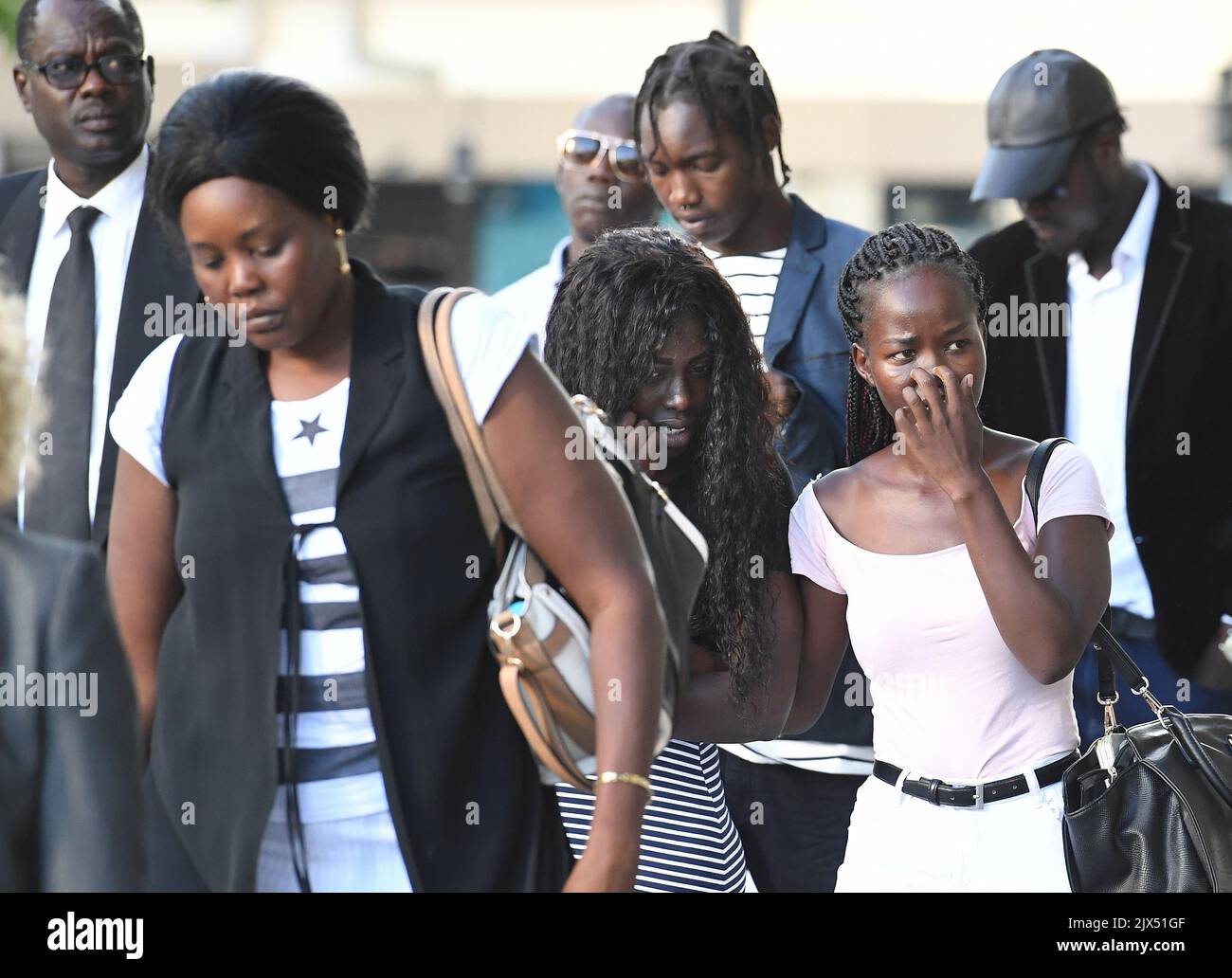 Family members of Ariik Mayot leave the Supreme Court in Brisbane ...