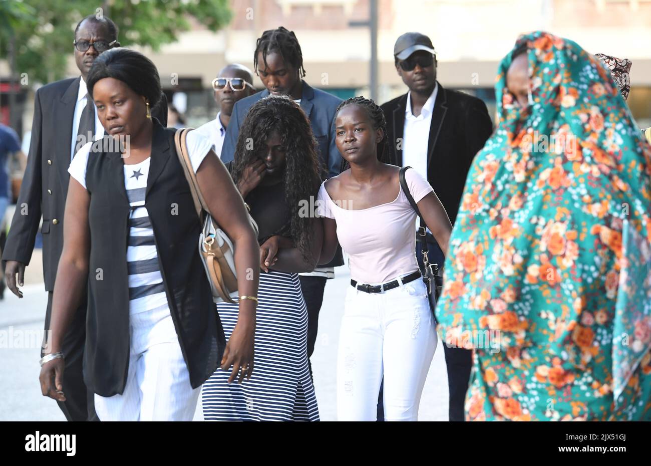 Family members of Ariik Mayot leave the Supreme Court in Brisbane ...