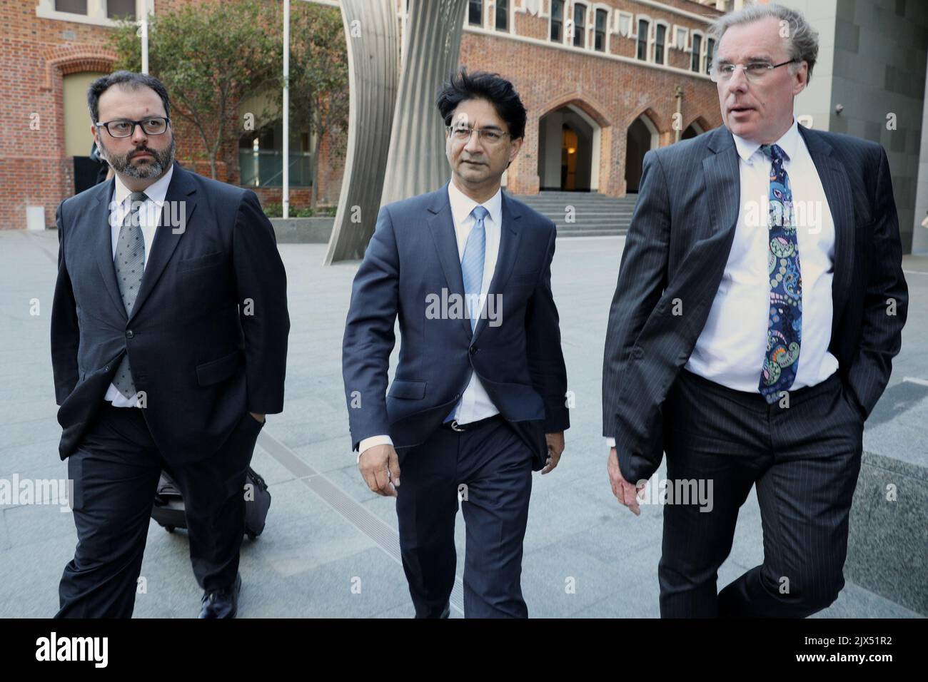 Barrister Lloyd Rayney (centre) and his lawyer Martin Bennett (right ...
