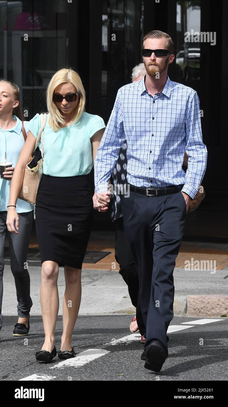 Mark Watterson (right) arrives at the Supreme Court in Brisbane ...